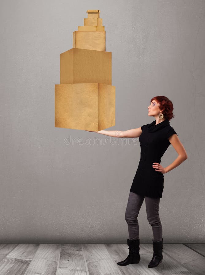 Young Lady Holding a Set of Brown Cardboard Boxes Stock Image - Image ...