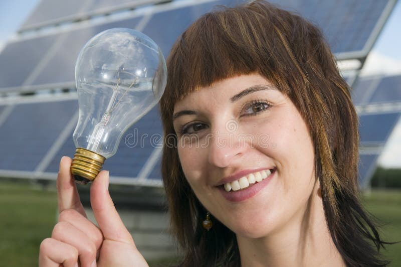 Young lady with light bulb stock image. Image of panel - 21173019
