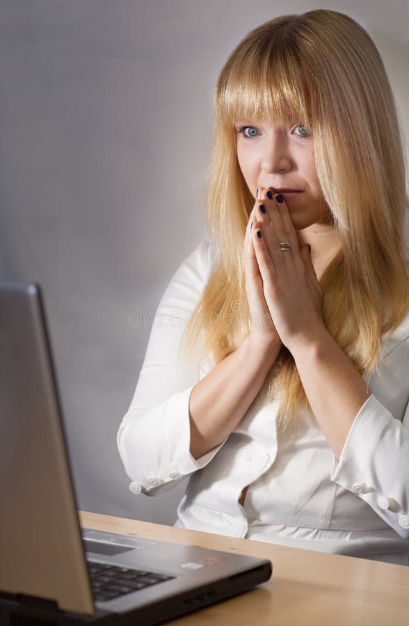 Young Lady Looking Worried in Front of Her Computer Stock Image - Image ...