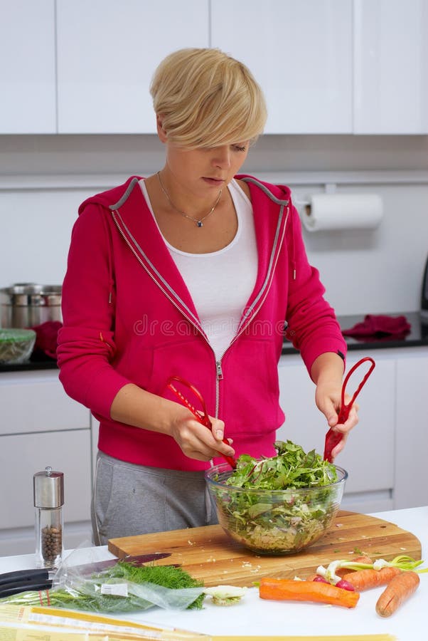 Young Lady Making Salad in Kitchen Stock Photo - Image of adult, food ...