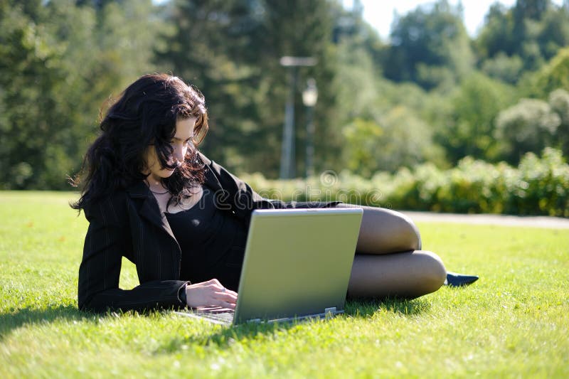 Young Lady with a Notebook in a Park Stock Photo - Image of internet ...