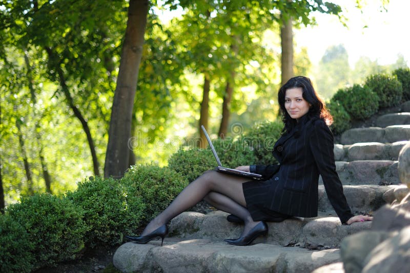 Young Lady with a Notebook in a Park Stock Photo - Image of casual ...