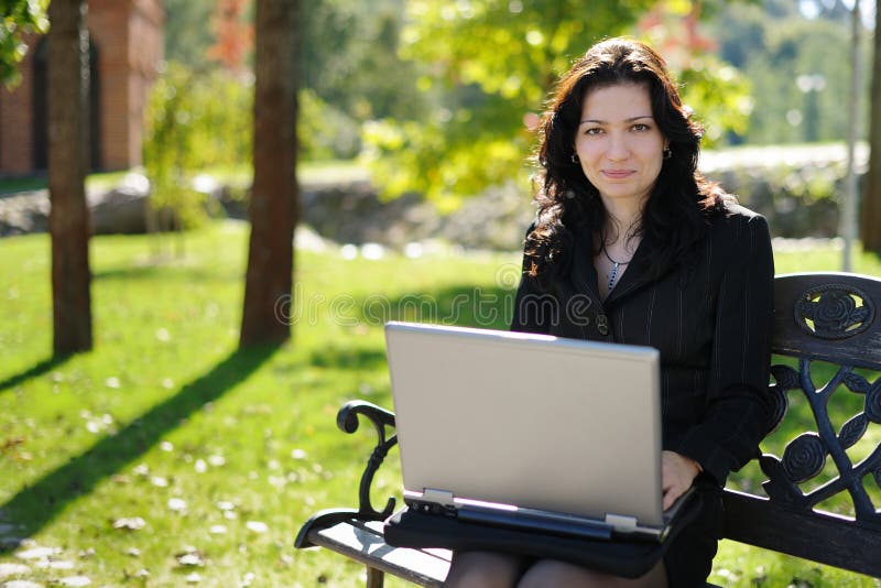 Young Lady with a Notebook in a Park Stock Image - Image of lady ...