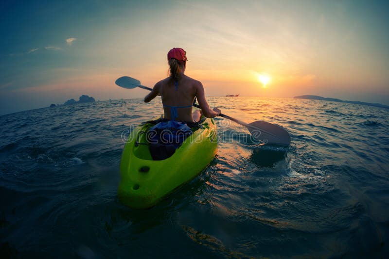 Young Lady Paddling the Kayak Stock Photo - Image of outdoor, paddling ...