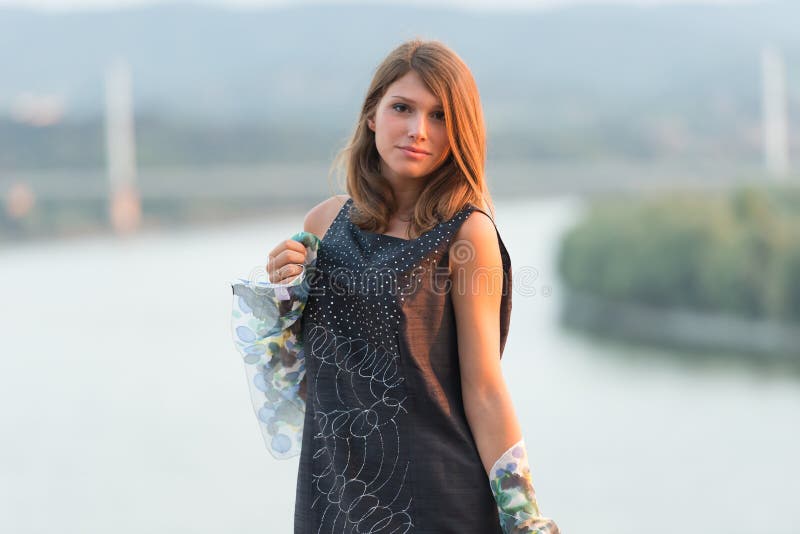 Young lady posing outside stock image. Image of scarf - 32837413