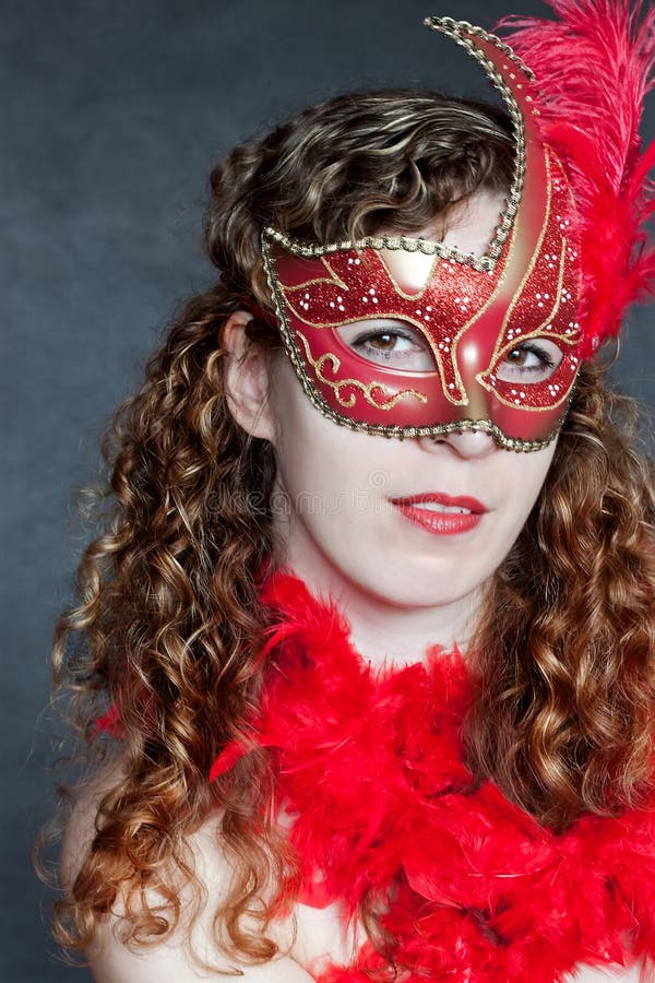 Young lady in a red mask stock photo. Image of female - 23835472
