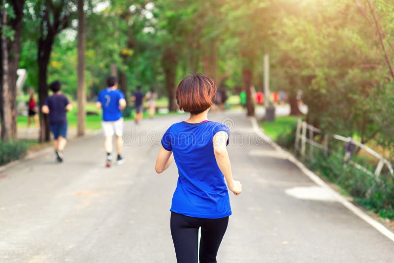 Young Lady Running on the Road Stock Photo - Image of sports, athlete ...