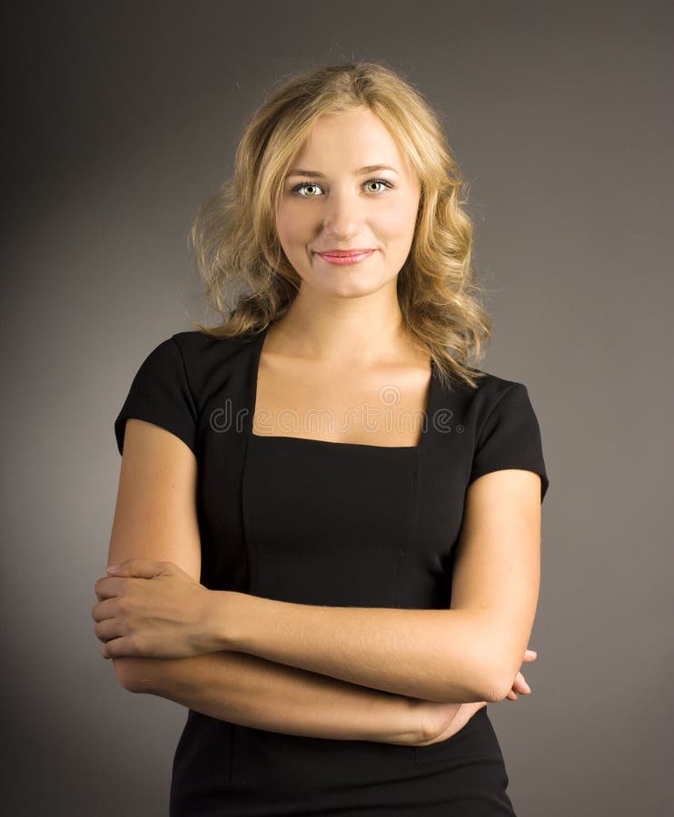 Young Lady Smiling, Looking into the Camera Stock Photo - Image of ...