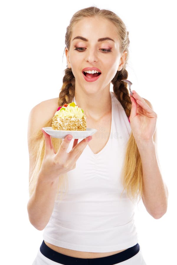 Young lady tasting a cake stock photo. Image of woman - 20621326