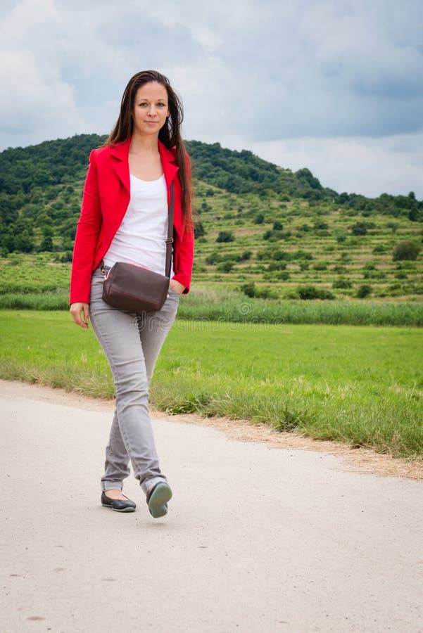 Young lady walking stock image. Image of girl, beautiful - 79375905