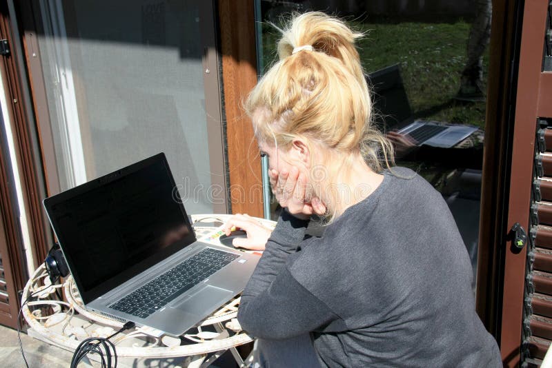 Young Lady Working from Home in Front of the House Stock Photo - Image ...