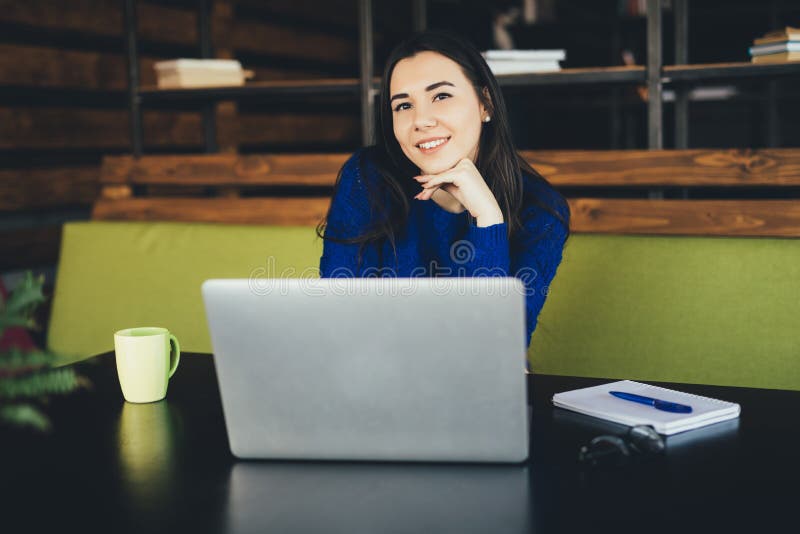Young Lady Working at Laptop in Modern Office Hub Stock Photo - Image ...