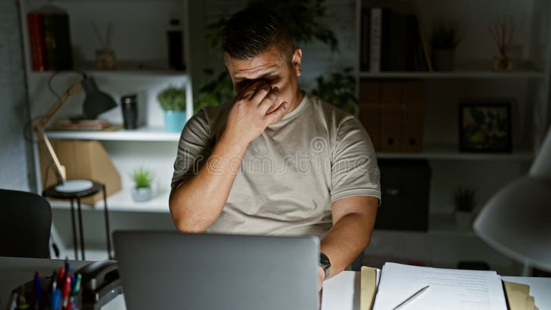Young Latin Business Worker, Stressed and Overworked, Anxiously ...