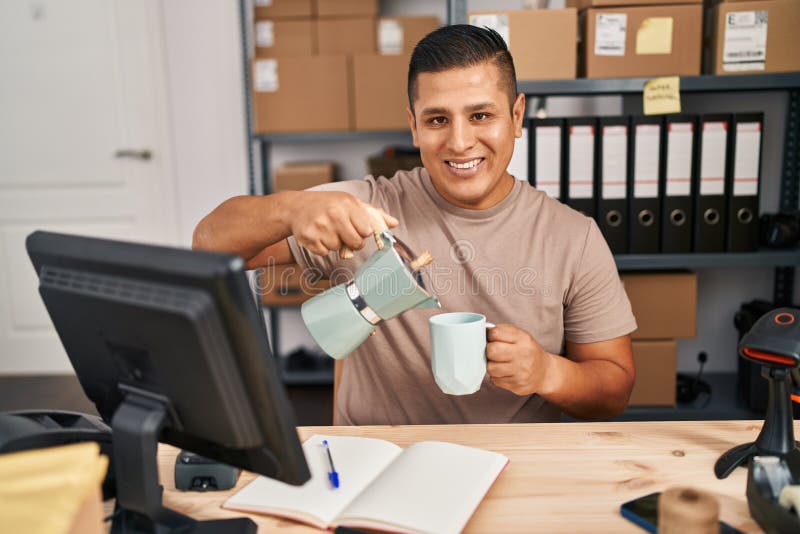 Young Latin Man Ecommerce Business Worker Pouring Coffee on Cup at ...