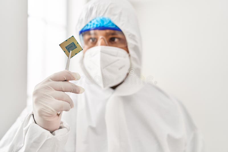 Young Latin Man Scientist Wearing Covid Protection Uniform Holding Cpu ...