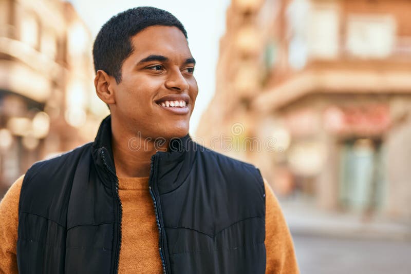 Young Latin Man Smiling Happy Standing at the City Stock Photo - Image ...