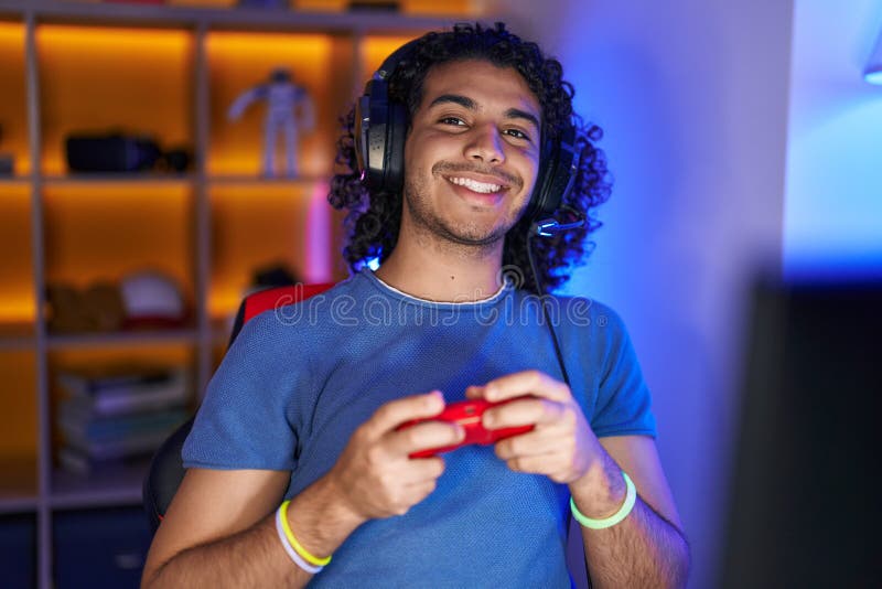 Young Latin Man Streamer Playing Video Game Using Joystick at Gaming ...