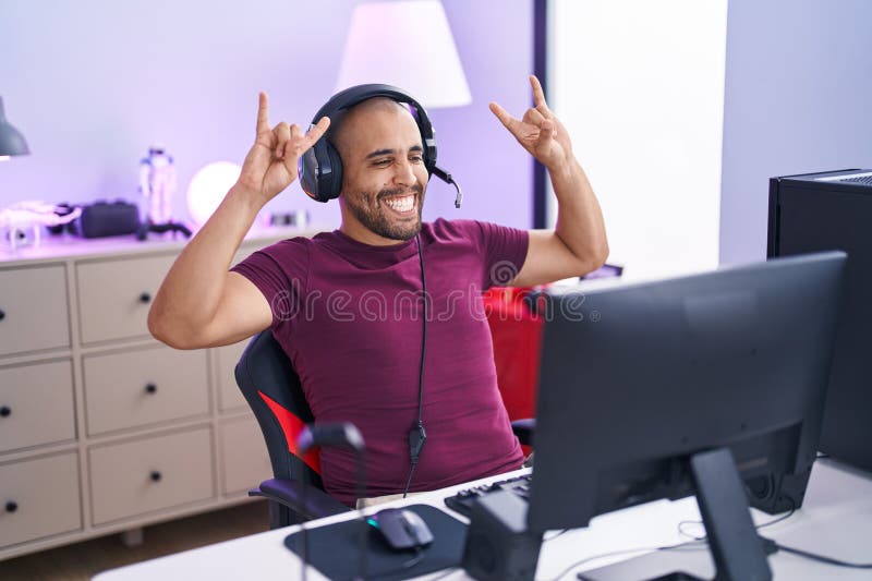 Young Latin Man Streamer Playing Video Game with Winner Expression at ...