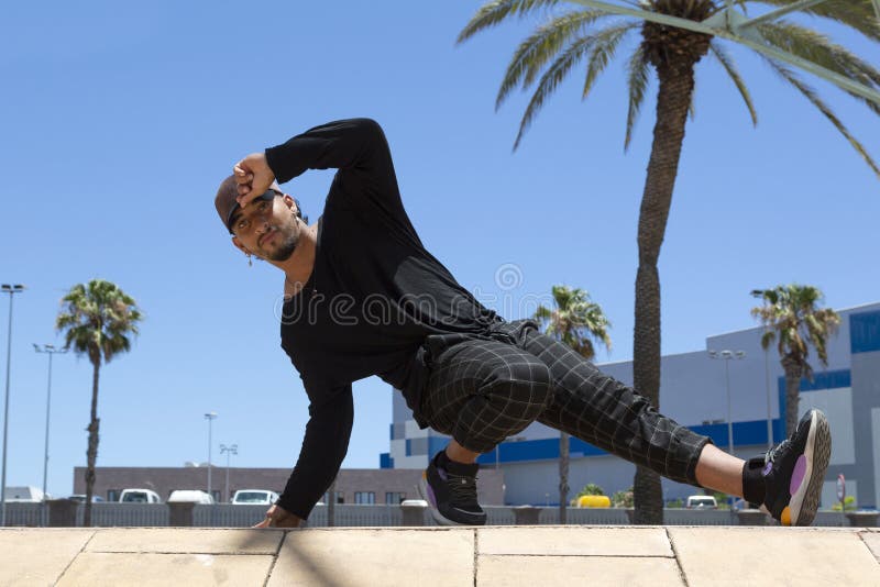 Latin Man Urban Acrobatic Dancer on the Street Doing a Performance ...
