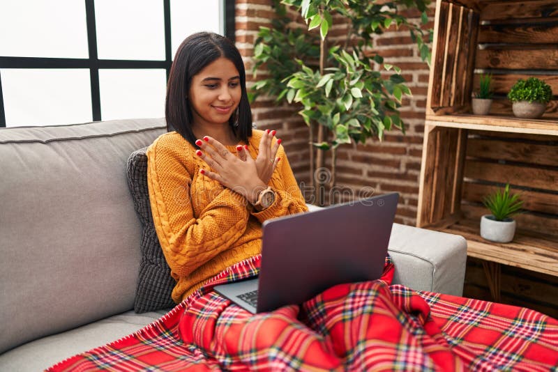 Young Latin Woman Having Video Call Using Deaf Sign Language at Home ...