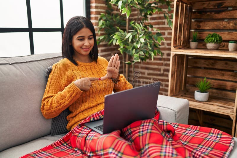 Young Latin Woman Having Video Call Using Deaf Sign Language at Home ...
