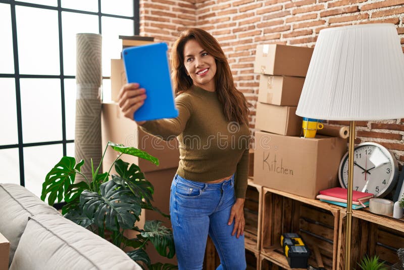 Young Latin Woman Make Selfie by the Touchpad at Hew Home Stock Image ...