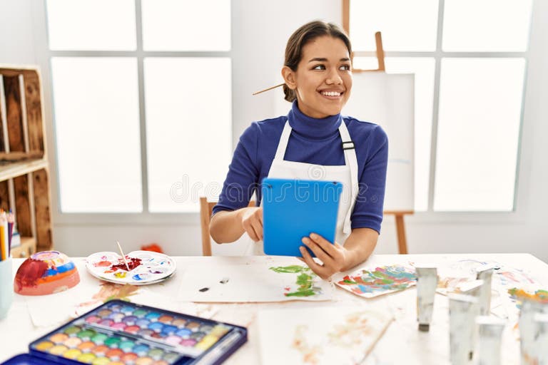 Young Latin Woman Using Touchpad Drawing at Art Studio Stock Image ...