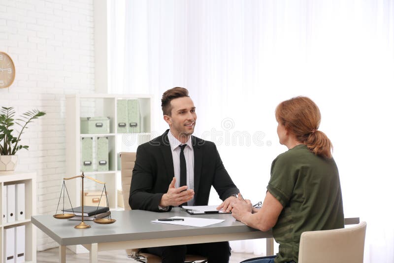 Young Lawyer Having Meeting with Senior Client Stock Image - Image of ...