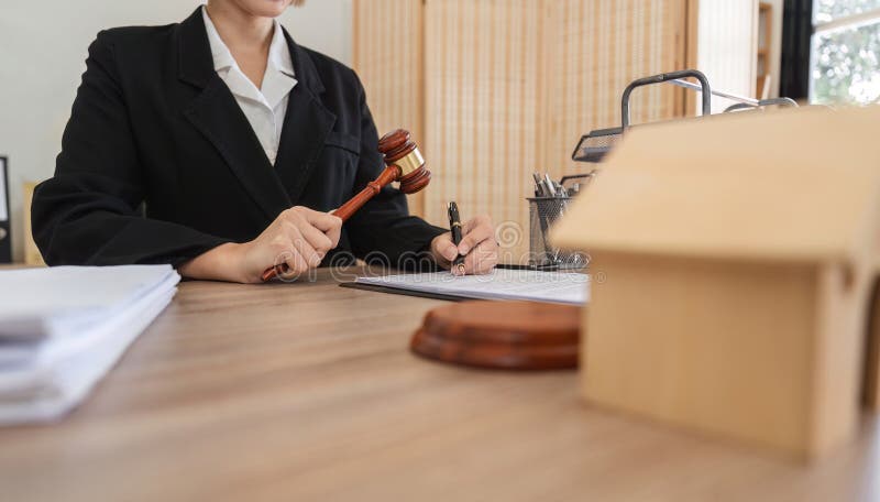 Young Lawyer Introducing Real Estate Legal Contract Documents in Modern ...