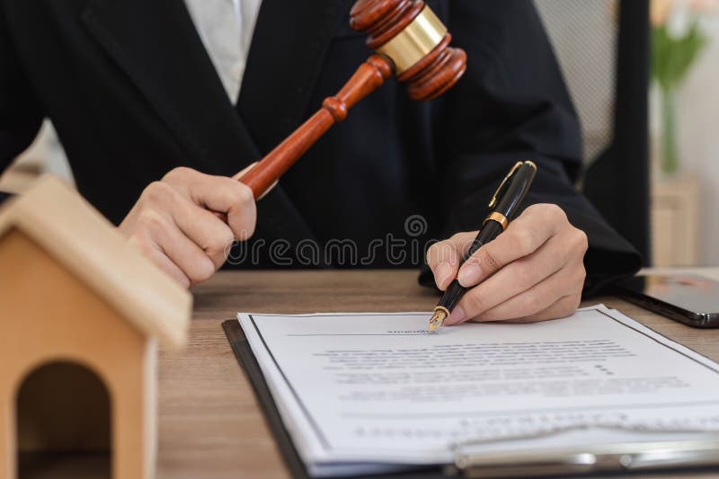 Young Lawyer Introducing Real Estate Legal Contract Documents in Modern ...