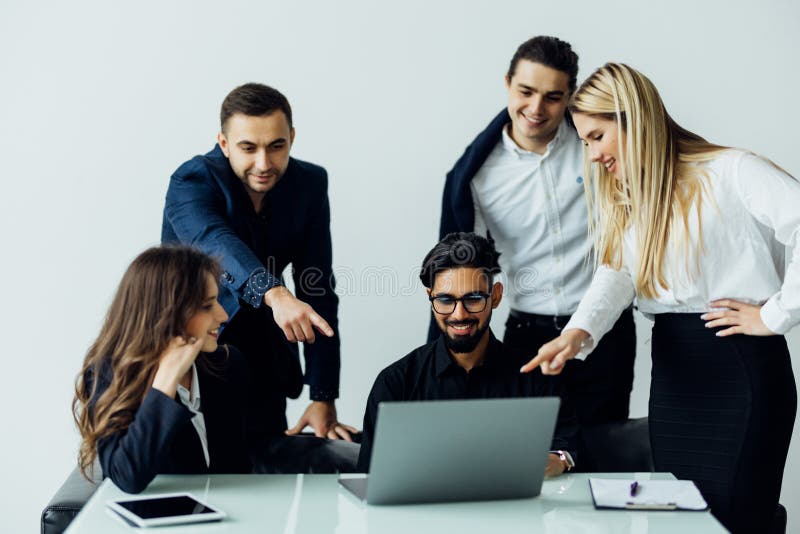 Young Leader Teaching Employees Group Analyzing Online Project ...