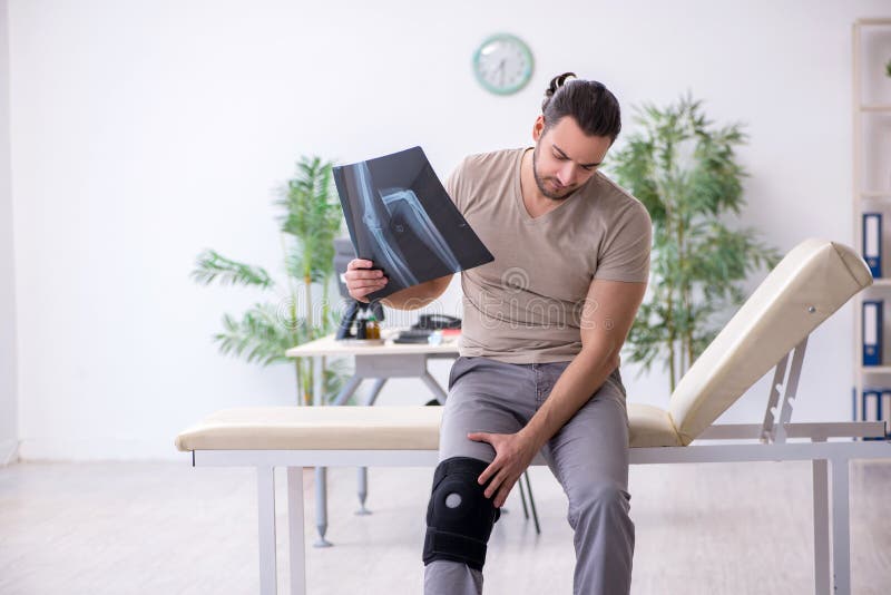Young Leg Injured Man Looking X-ray Stock Photo - Image of accident ...