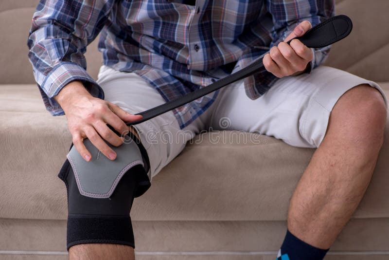Young Leg Injured Man Suffering at Home Stock Photo - Image of ...