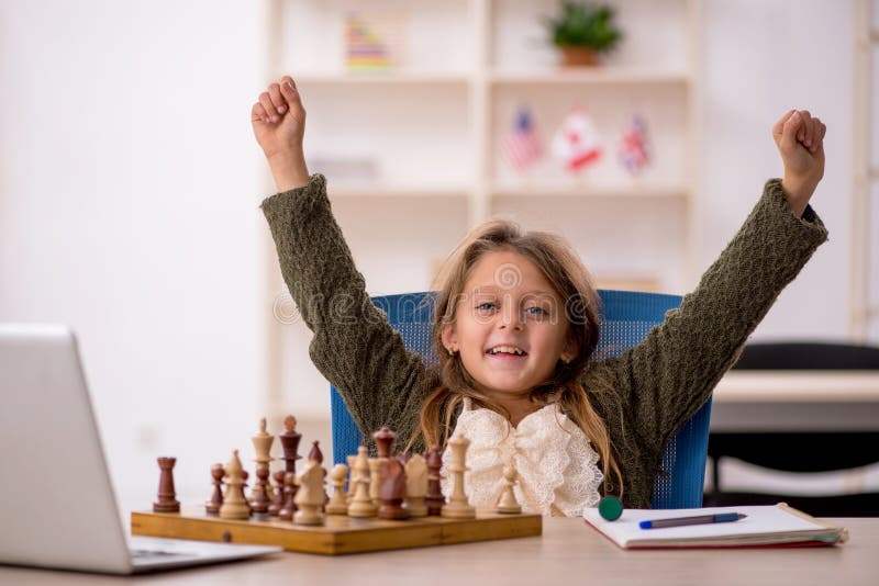 Young Little Girl Playing Chess at Home Stock Photo - Image of winning ...