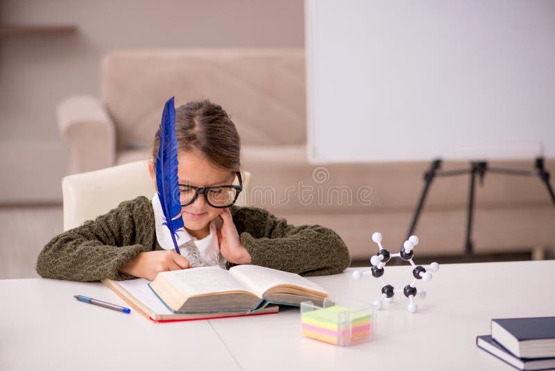 Young Little Girl Studying at Home Stock Photo - Image of handwriting ...