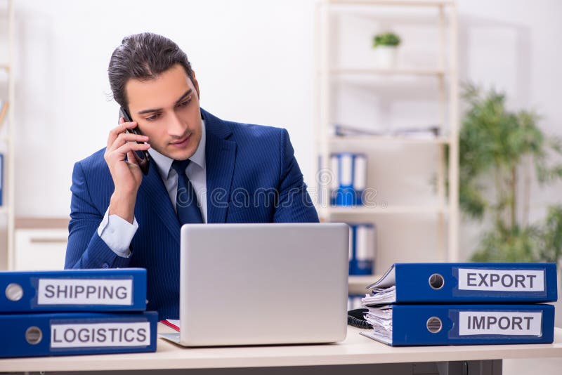 Young Male Logistics Specialist Working in the Office Stock Photo ...