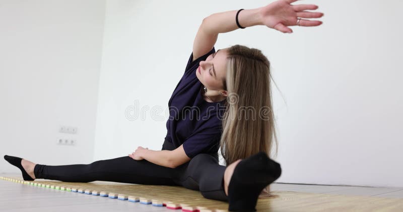 Woman Performs Stretching Exercise Raising Arms on White Stock Video ...