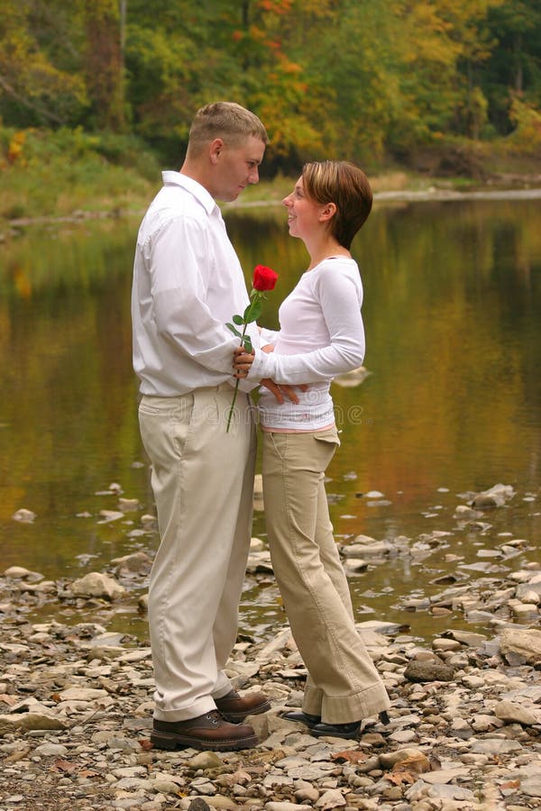 Young Love stock image. Image of fall, creek, romantic - 284987