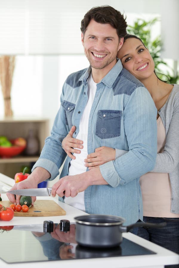 Young Love Couple Hugs on Kitchen Stock Photo - Image of fresh ...