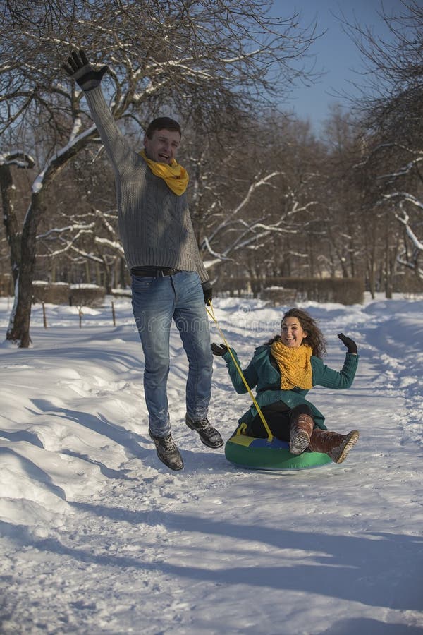 Young Lovers Having Fun in Winter Clothes in the Park. Elegant W Stock ...