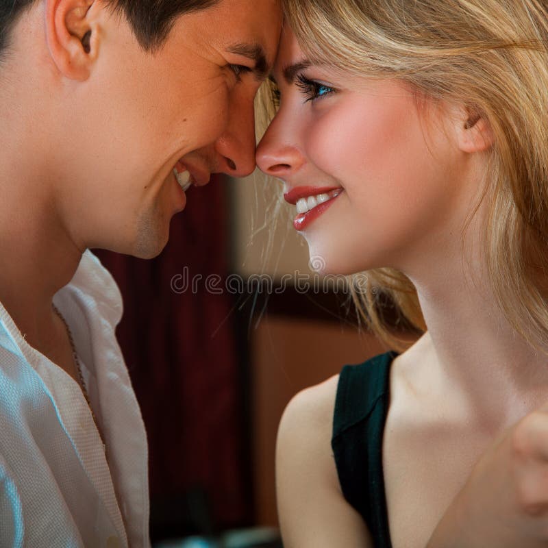 Young Lovers Looking at Each Other and Laugh Stock Image - Image of ...