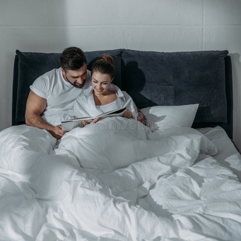 Young Loving Couple Embrace in Bed Stock Image - Image of couple ...