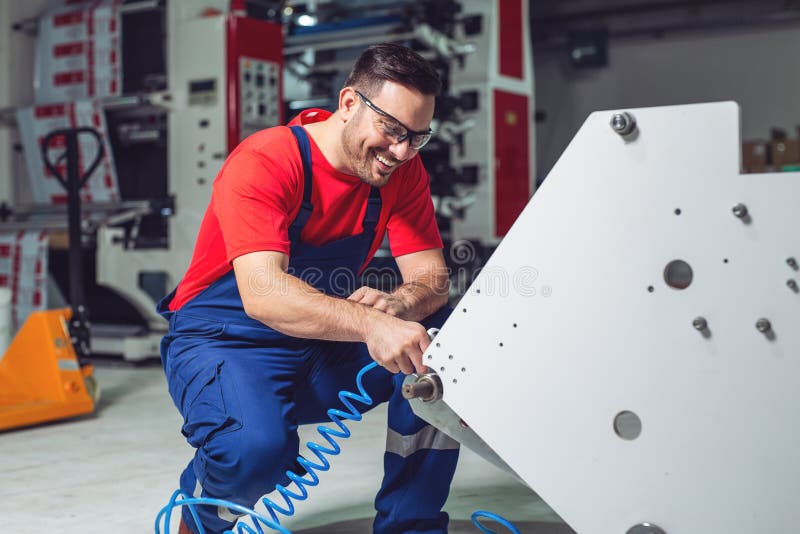 Maintenance Engineer Repair Modern Industrial Machine. Stock Image ...