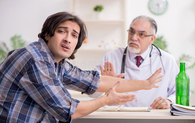 Young Male Alcoholic Visiting Old Doctor Stock Image - Image of ...