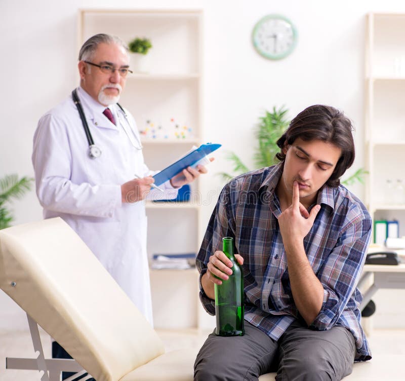 Young Male Alcoholic Visiting Old Doctor Stock Image - Image of doctor ...