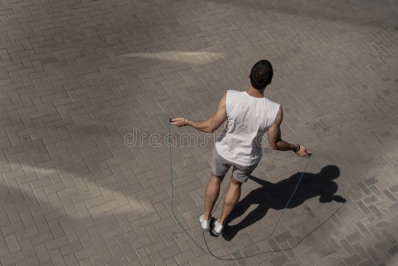 Young Male Athlete Skipping Rope Outdoors Stock Image - Image of copy ...