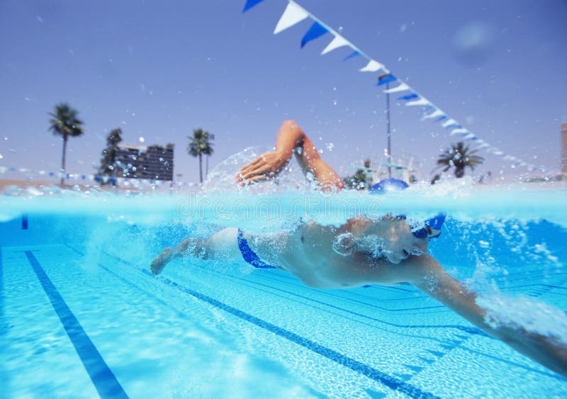 Underwater Shot of Professional Male Athlete Swimming in Pool Stock ...