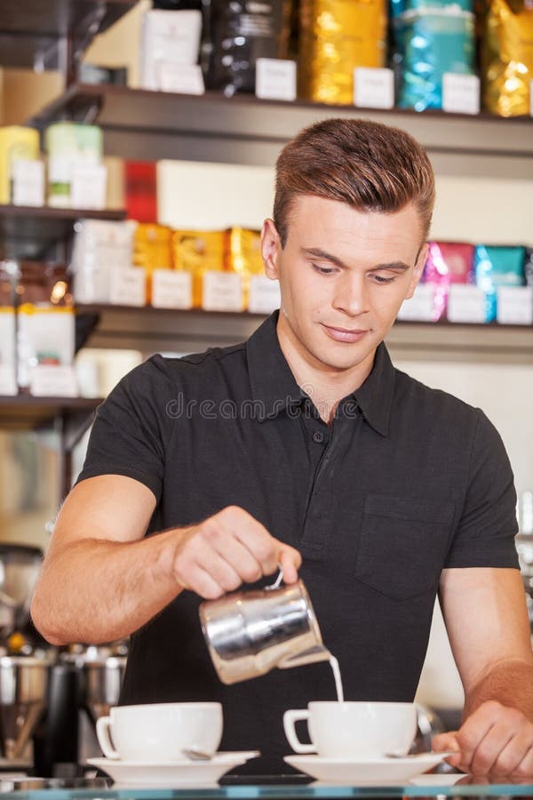 Young Male Barista Adding Milk. Stock Image - Image of beverage ...