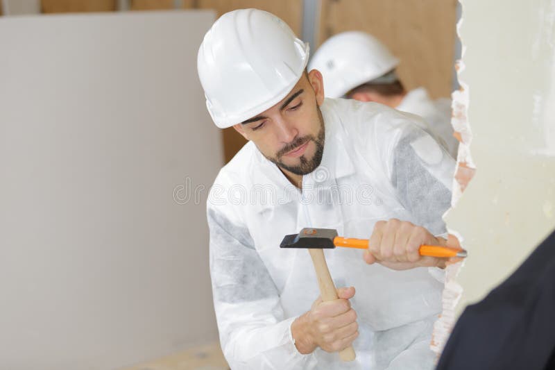 Young Male Builder Using Hammer and Chisel Stock Image - Image of adult ...