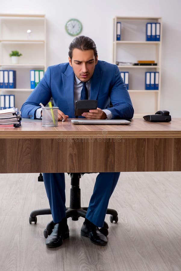 Young Male Businessman Employee Working in the Office Stock Image ...